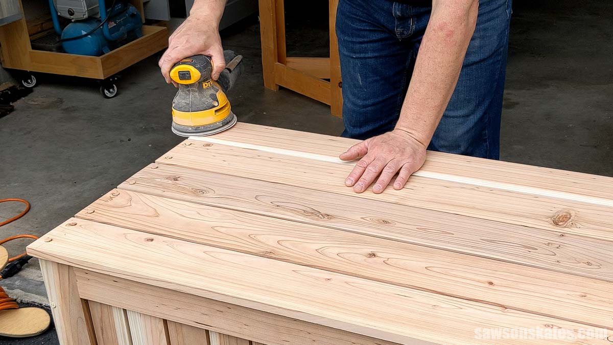 DIY Outdoor Storage Box with Doors | Saws on Skates®