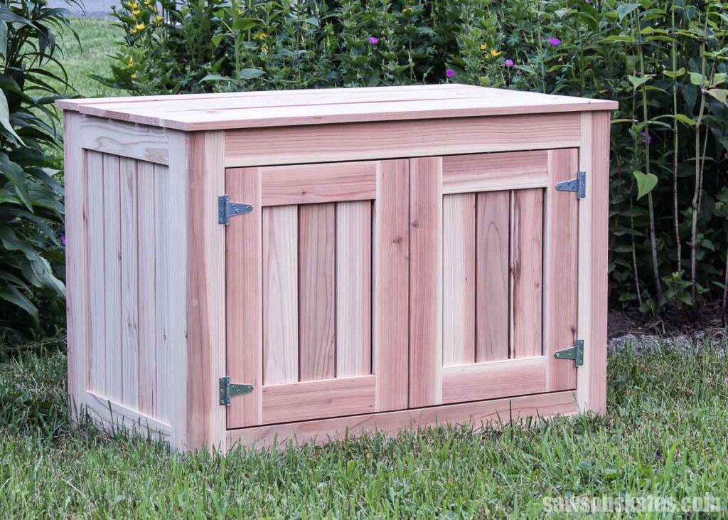 DIY Outdoor Storage Box with Doors | Saws on Skates®